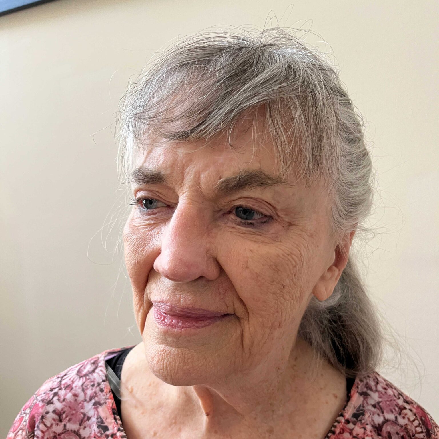 Barbara Kessel wears badge of honor with poem "Oh, Seroma"